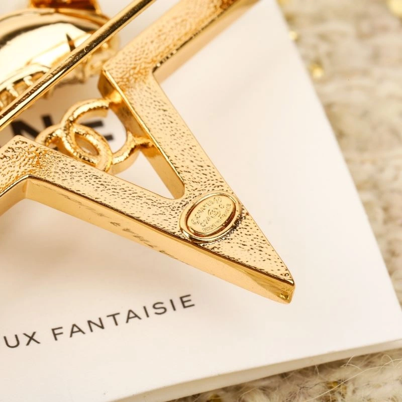 Cut-rate Chanel Brooches