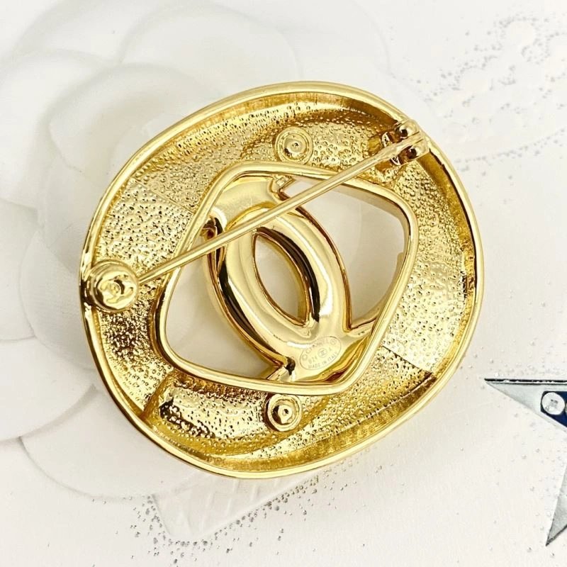Reasonably priced Chanel Brooches