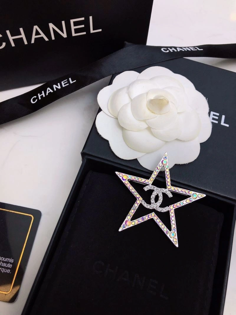 Indistinguishable Chanel Brooches