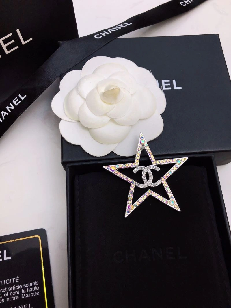 Indistinguishable Chanel Brooches