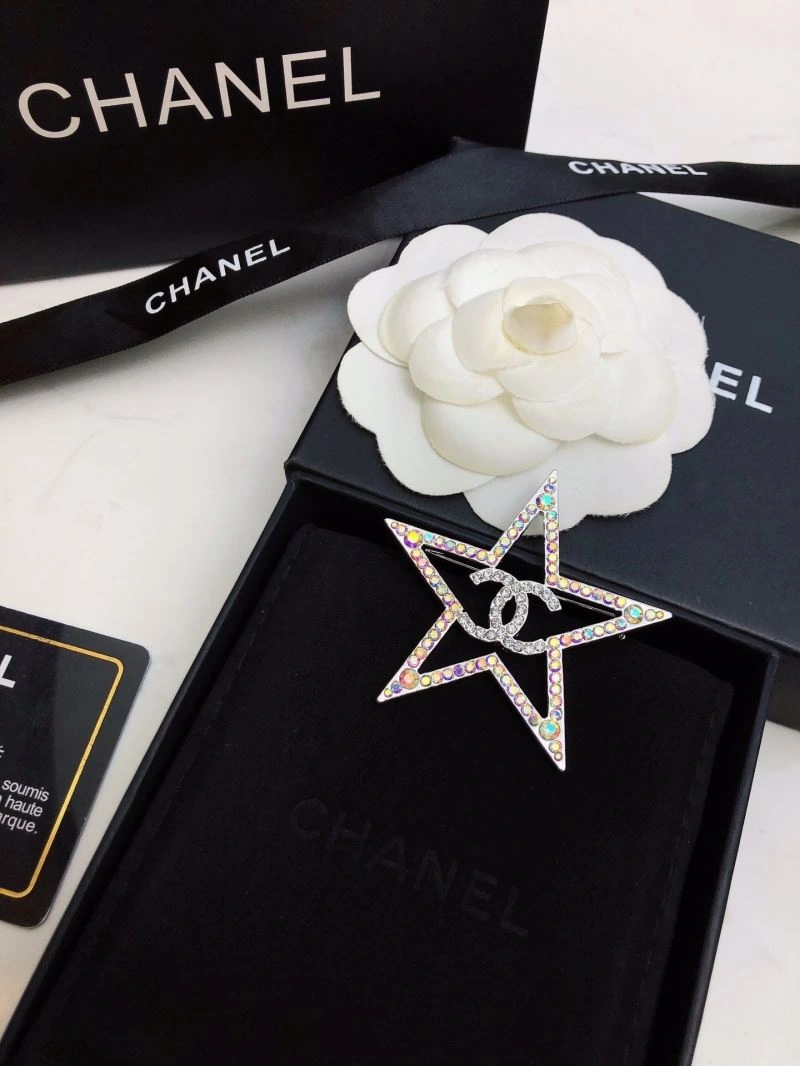 Indistinguishable Chanel Brooches