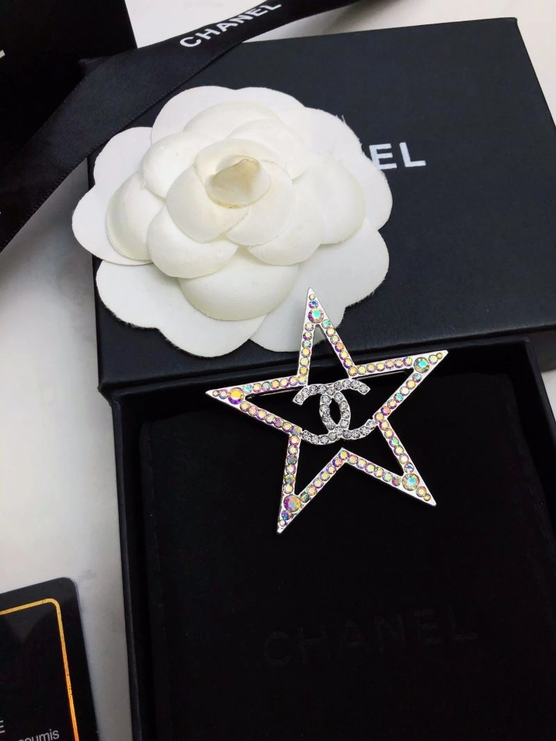 Indistinguishable Chanel Brooches