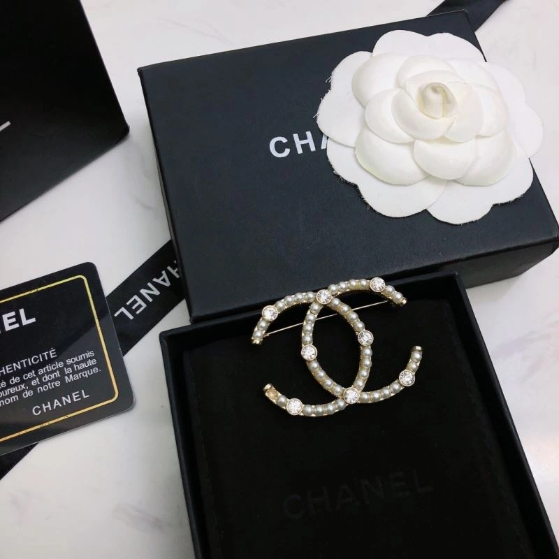 Indistinguishable Chanel Brooches