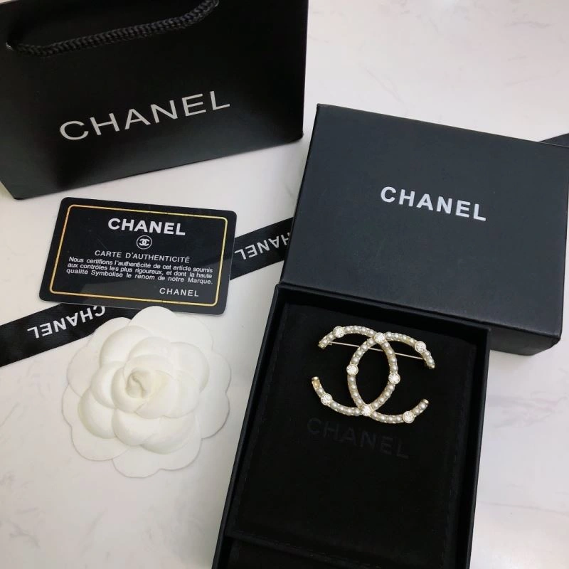 Indistinguishable Chanel Brooches