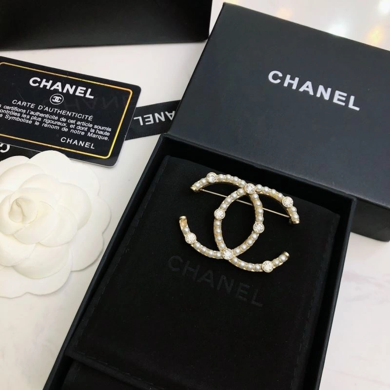 Indistinguishable Chanel Brooches