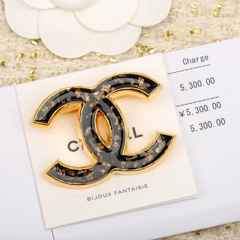 Cut-rate Chanel Brooches