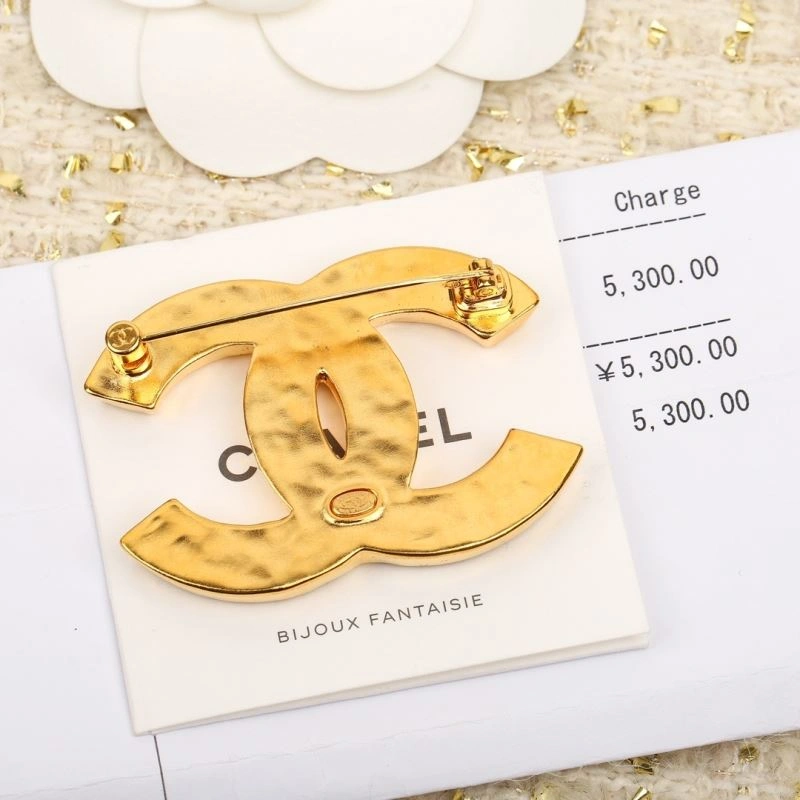 Cut-rate Chanel Brooches