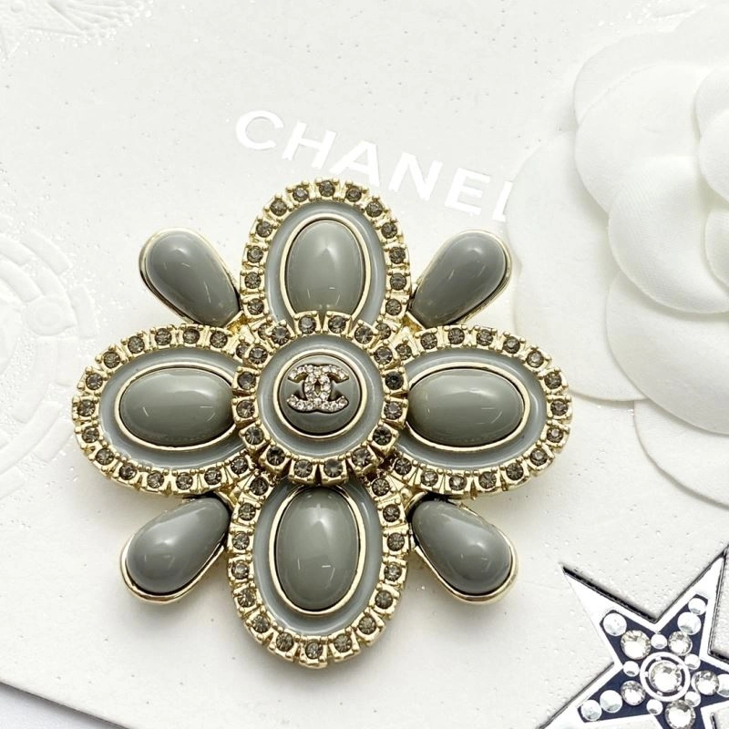Cut-rate Chanel Brooches