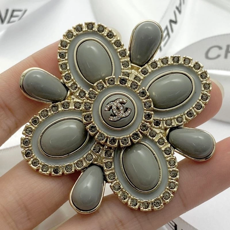 Cut-rate Chanel Brooches