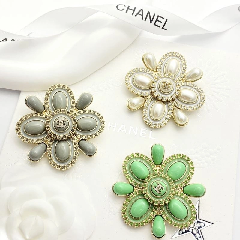 Cut-rate Chanel Brooches