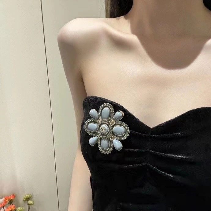 Cut-rate Chanel Brooches