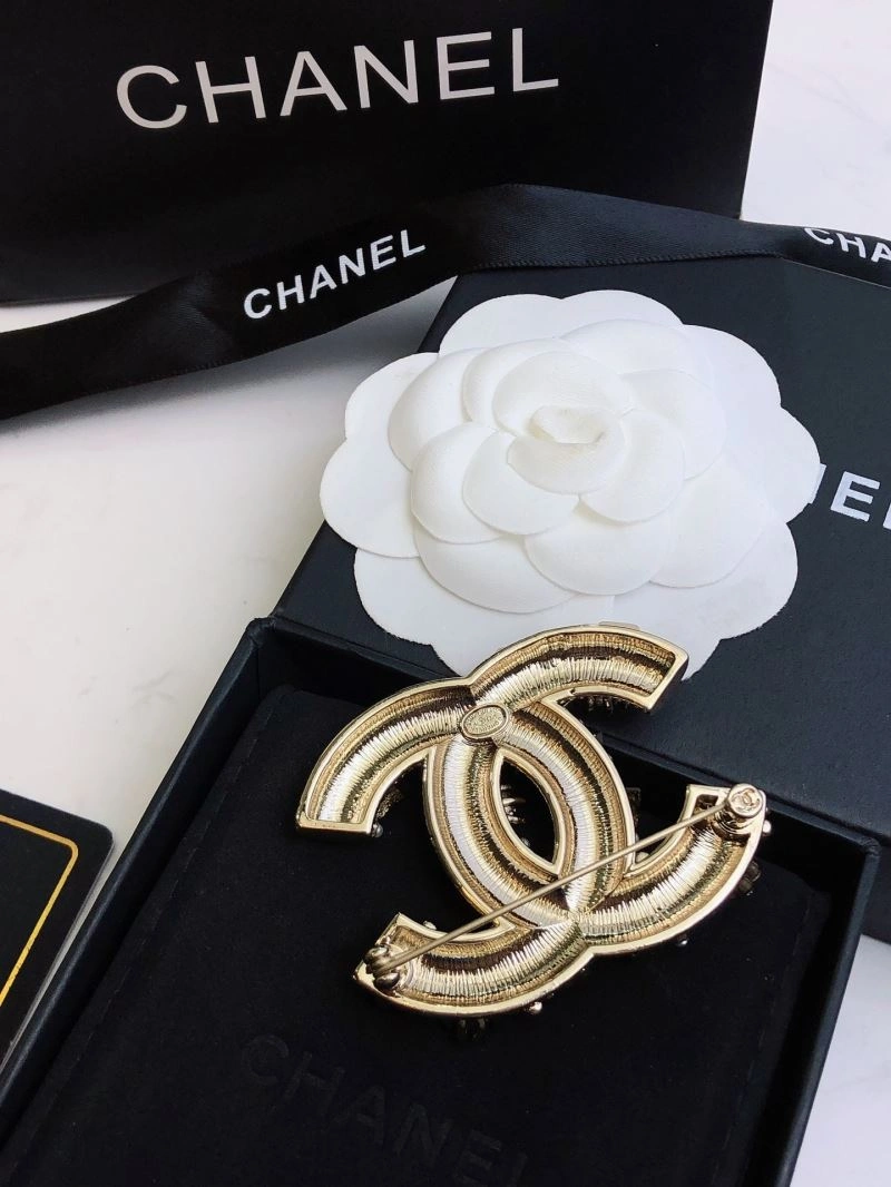 Cut-rate Chanel Brooches