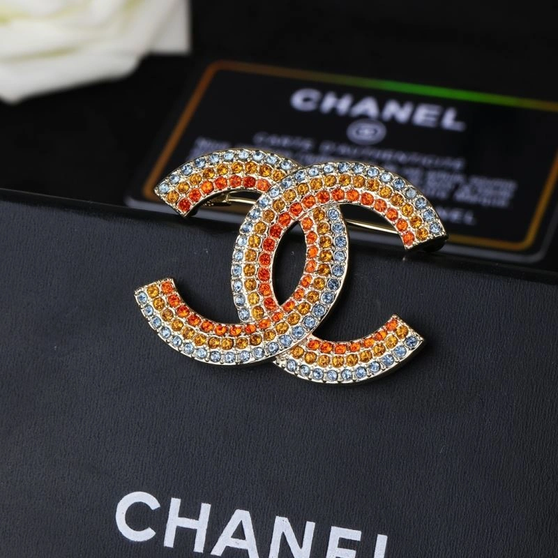 Indistinguishable Chanel Brooches