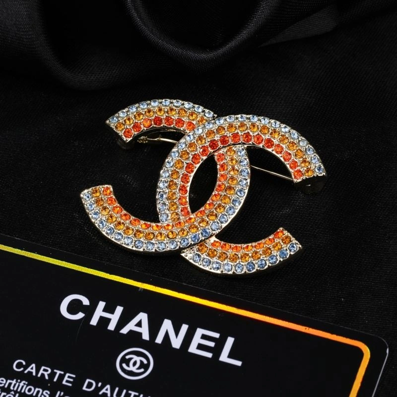 Indistinguishable Chanel Brooches