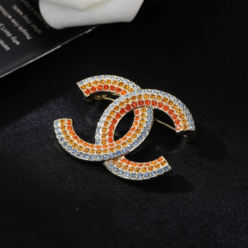 Indistinguishable Chanel Brooches