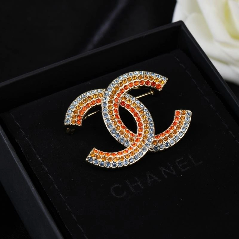 Indistinguishable Chanel Brooches