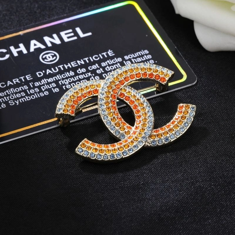 Indistinguishable Chanel Brooches
