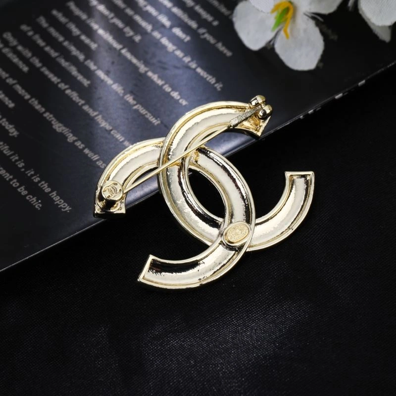 Indistinguishable Chanel Brooches