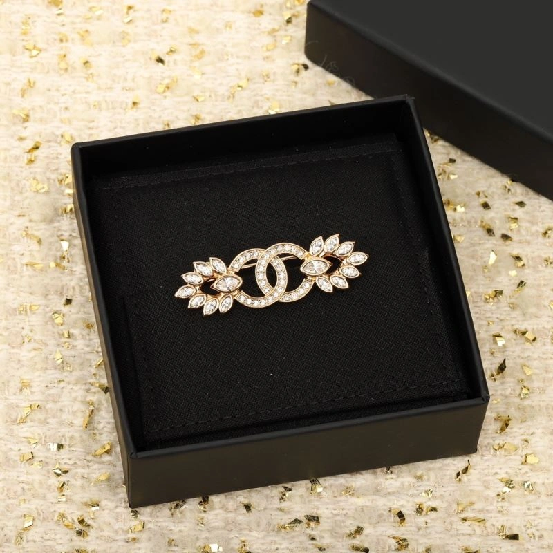 Indistinguishable Chanel Brooches