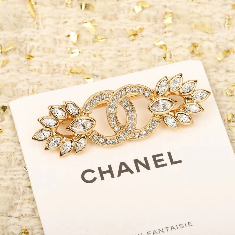 Indistinguishable Chanel Brooches