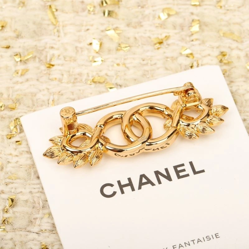 Indistinguishable Chanel Brooches