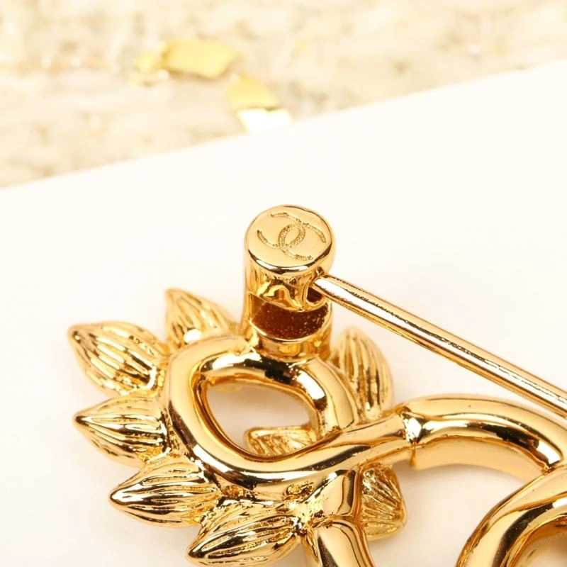 Indistinguishable Chanel Brooches