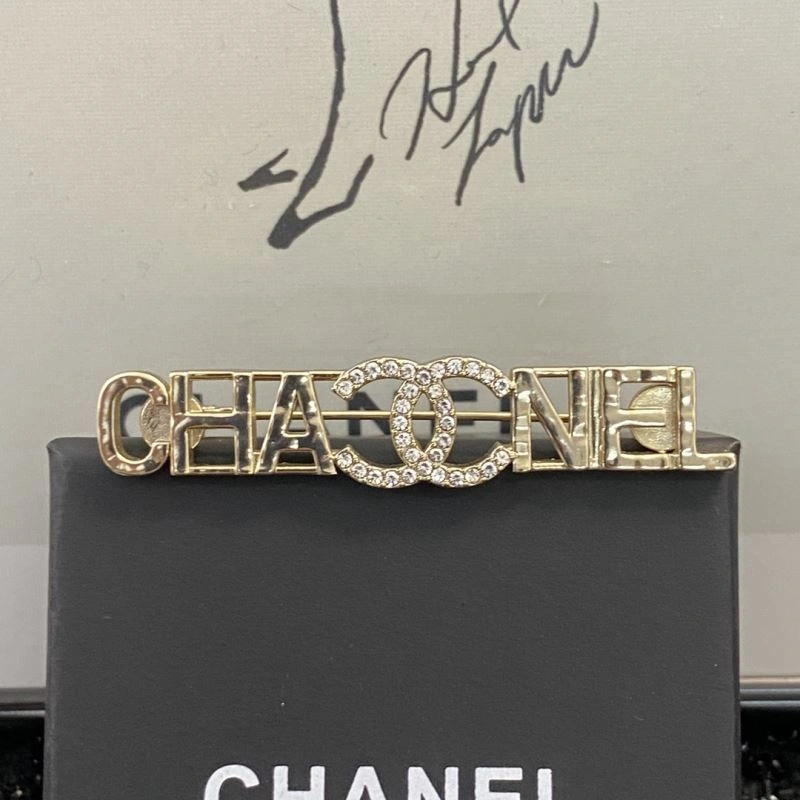 Cut-rate Chanel Brooches