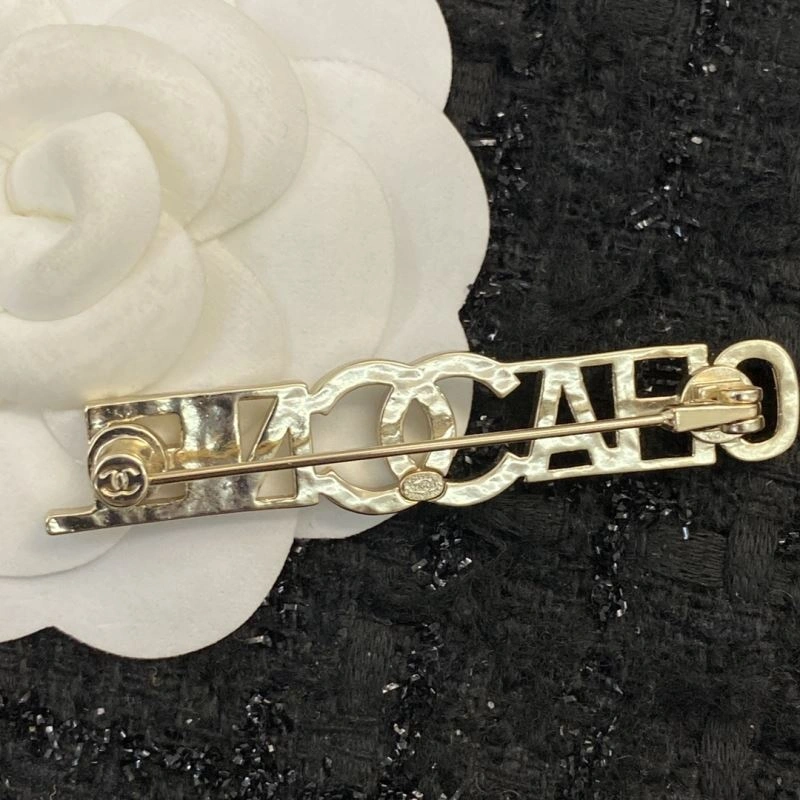 Cut-rate Chanel Brooches