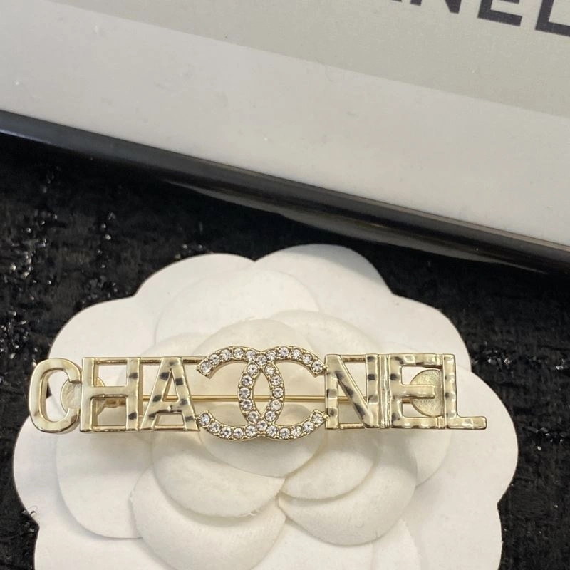 Cut-rate Chanel Brooches