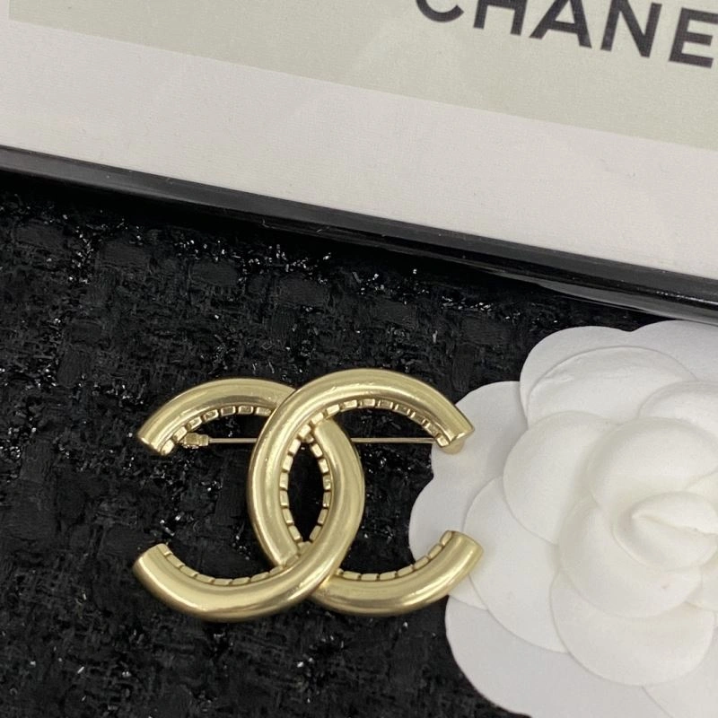Indistinguishable Chanel Brooches