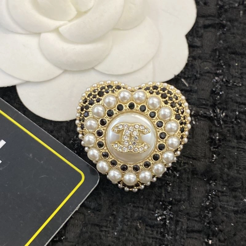 Indistinguishable Chanel Brooches