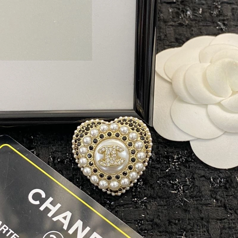Indistinguishable Chanel Brooches