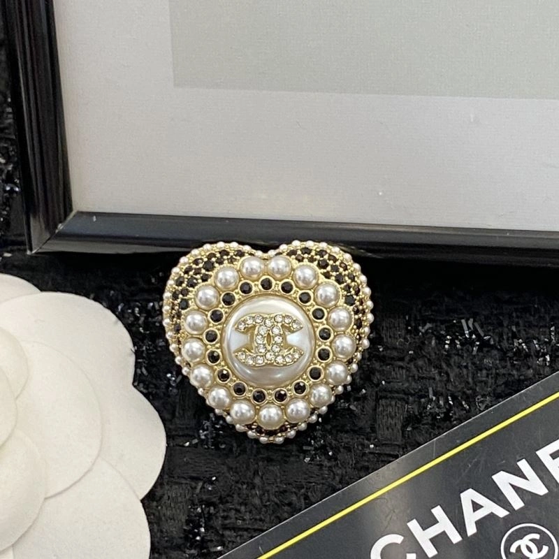 Indistinguishable Chanel Brooches