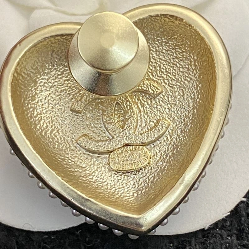 Indistinguishable Chanel Brooches