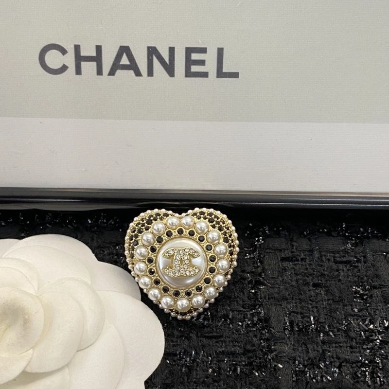Indistinguishable Chanel Brooches