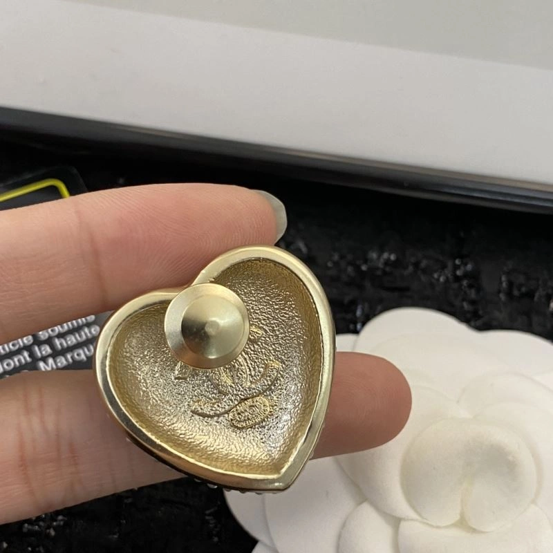 Indistinguishable Chanel Brooches