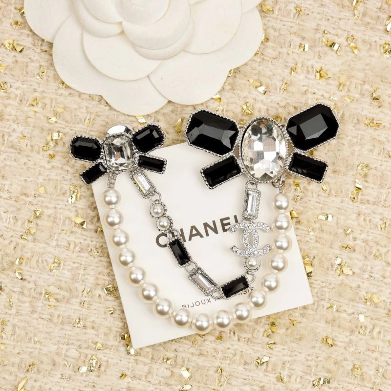 Indistinguishable Chanel Brooches