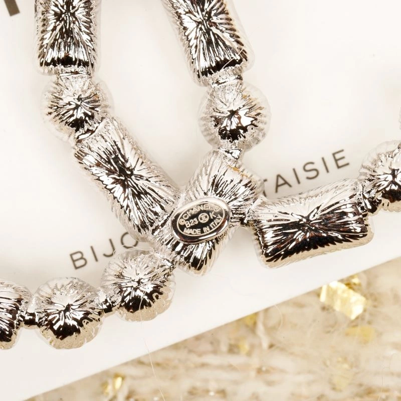 Reasonably priced Chanel Brooches