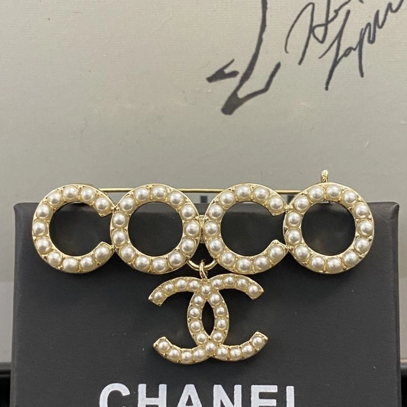 Indistinguishable Chanel Brooches