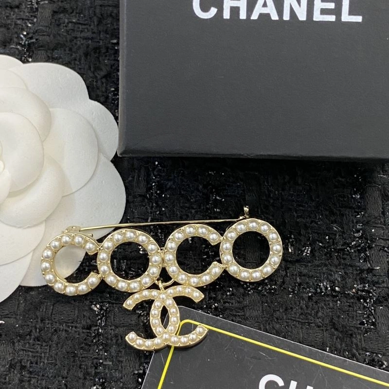 Indistinguishable Chanel Brooches