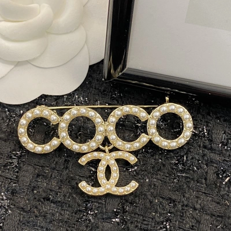 Indistinguishable Chanel Brooches