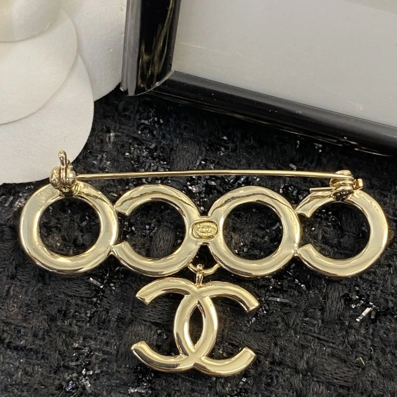 Indistinguishable Chanel Brooches