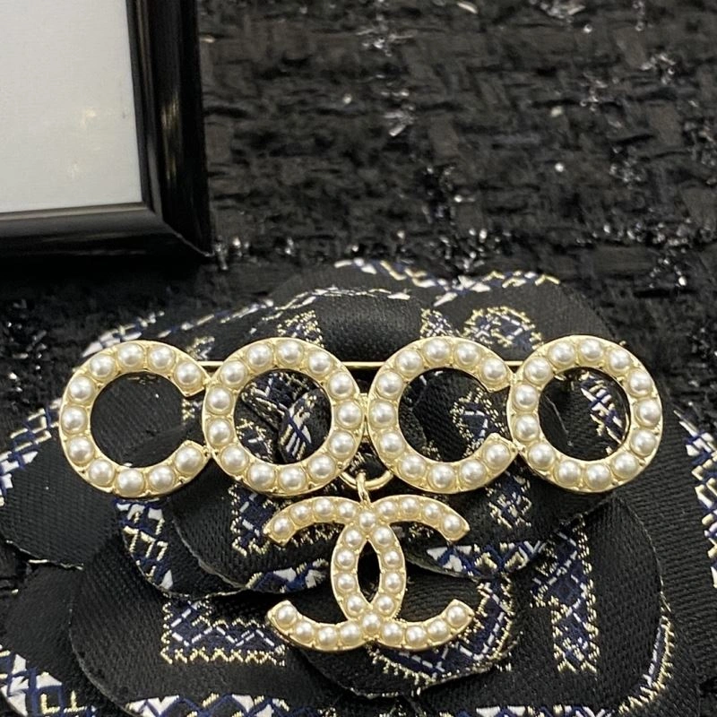 Indistinguishable Chanel Brooches