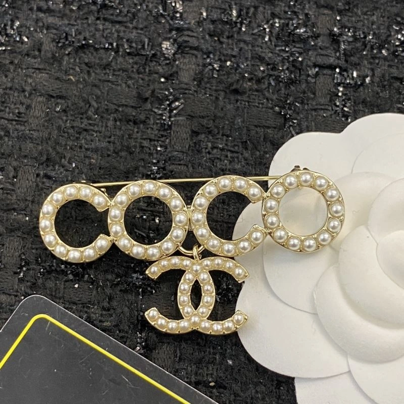 Indistinguishable Chanel Brooches