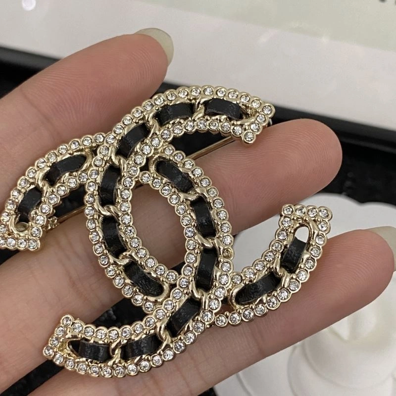 Brand-authenticated Chanel Brooches