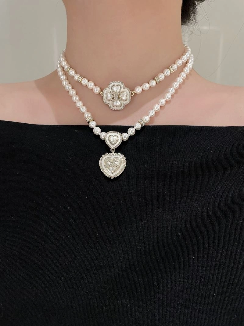 Indistinguishable Chanel Brooches