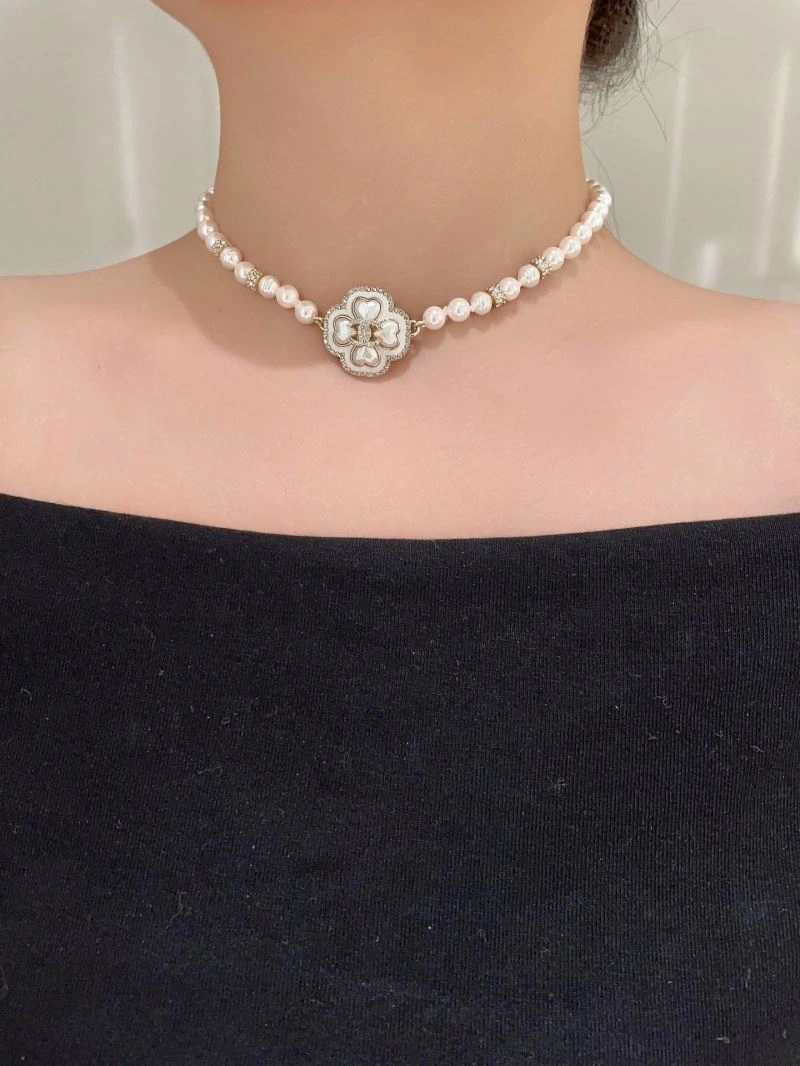 Indistinguishable Chanel Brooches