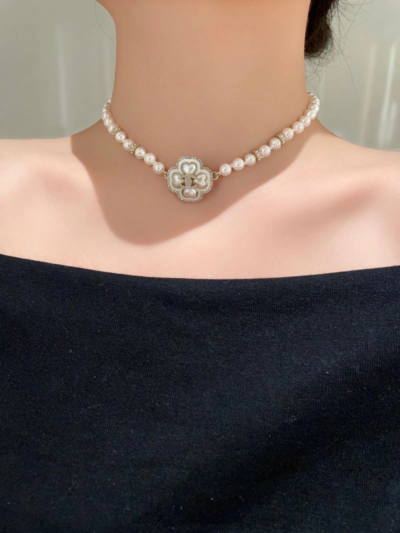 Indistinguishable Chanel Brooches