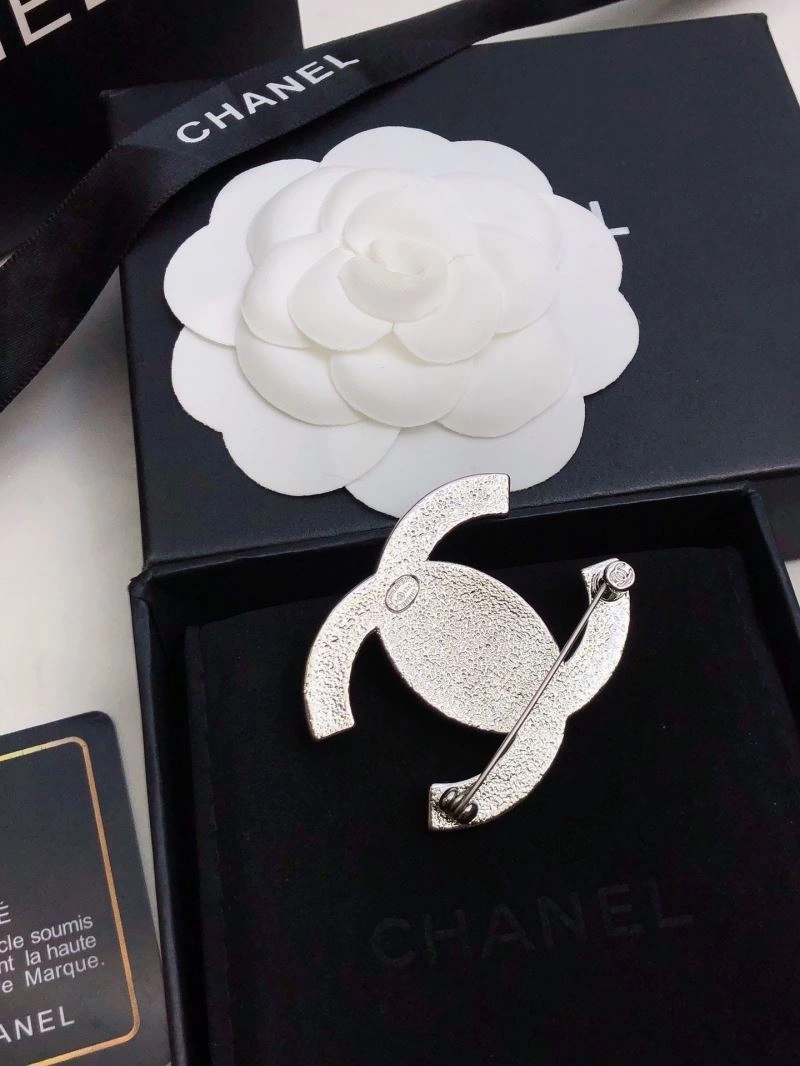 Cut-rate Chanel Brooches