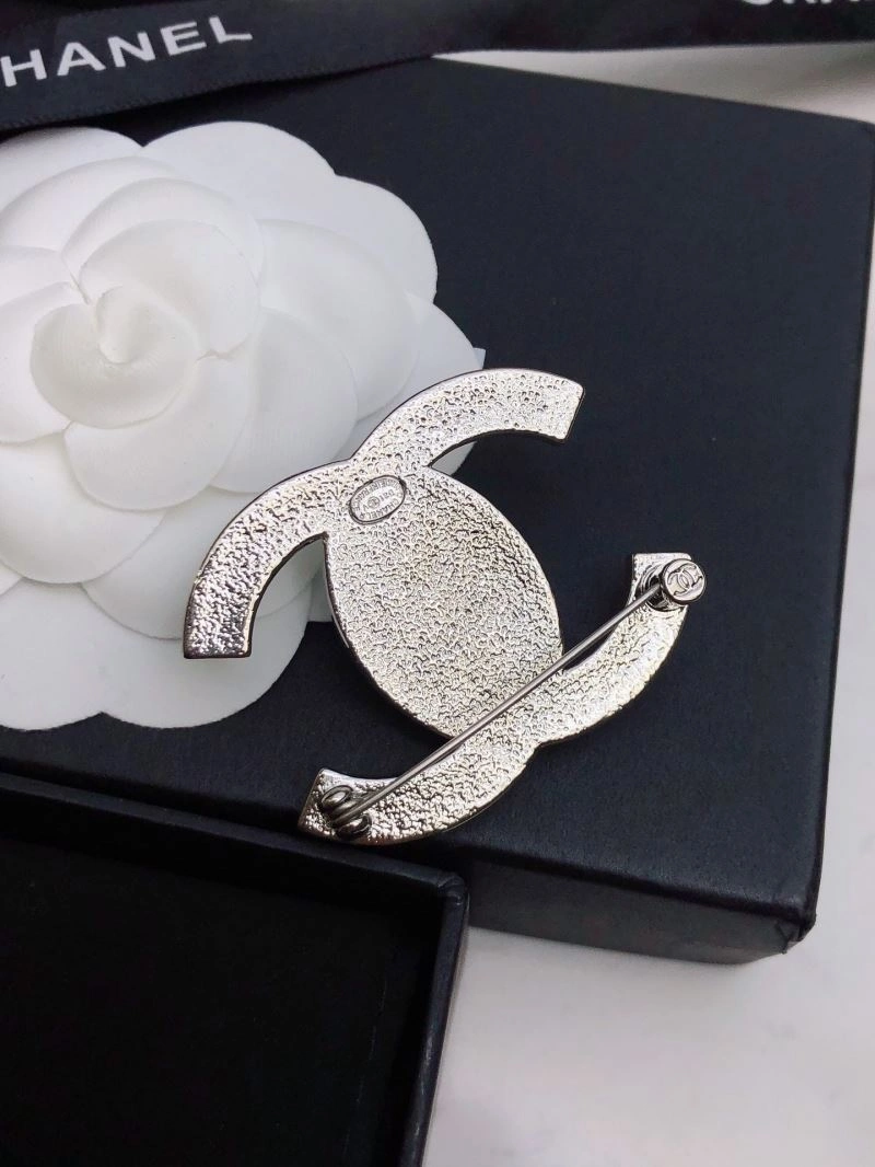 Cut-rate Chanel Brooches